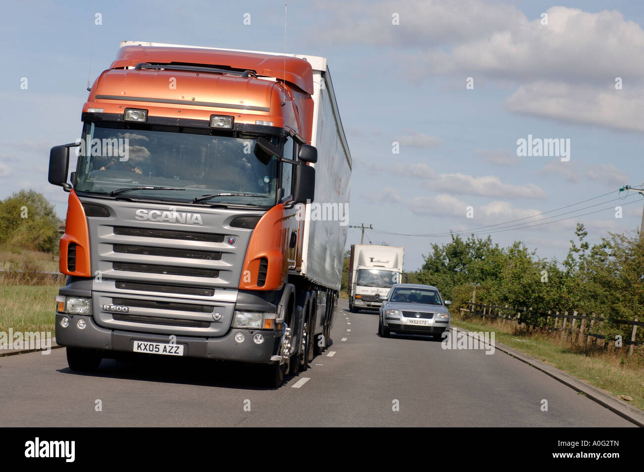 scania r500 v8 lorry overtaking traffic on a dual carriageway in the uk ...