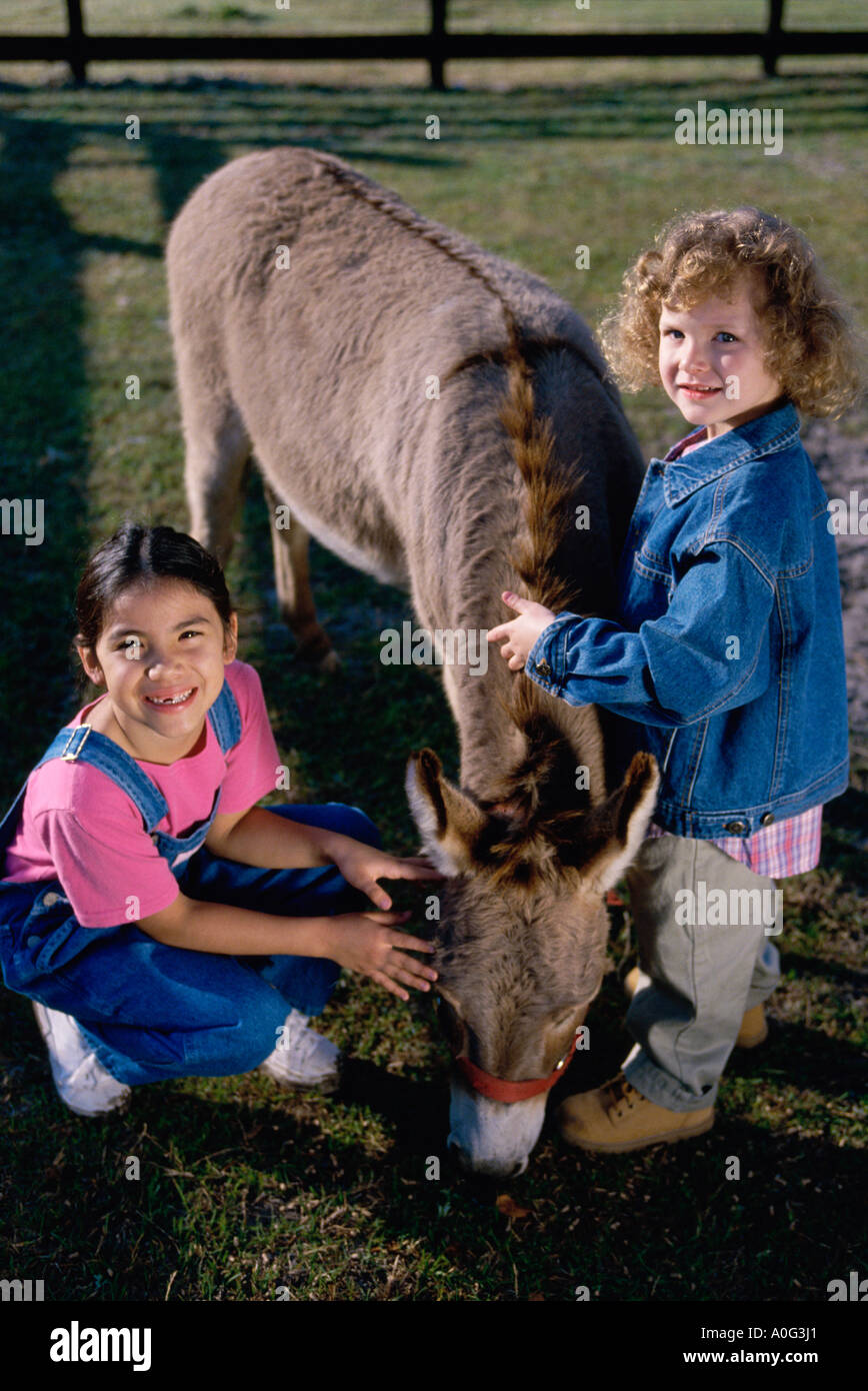 Girls with a donkey hi-res stock photography and images - Alamy