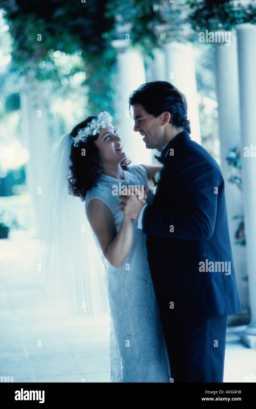 Side profile of a newlywed couple dancing Stock Photo - Alamy