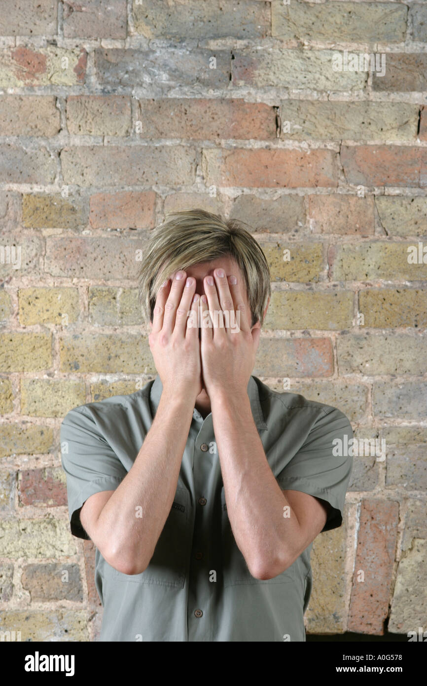 Hands over face hi-res stock photography and images - Alamy