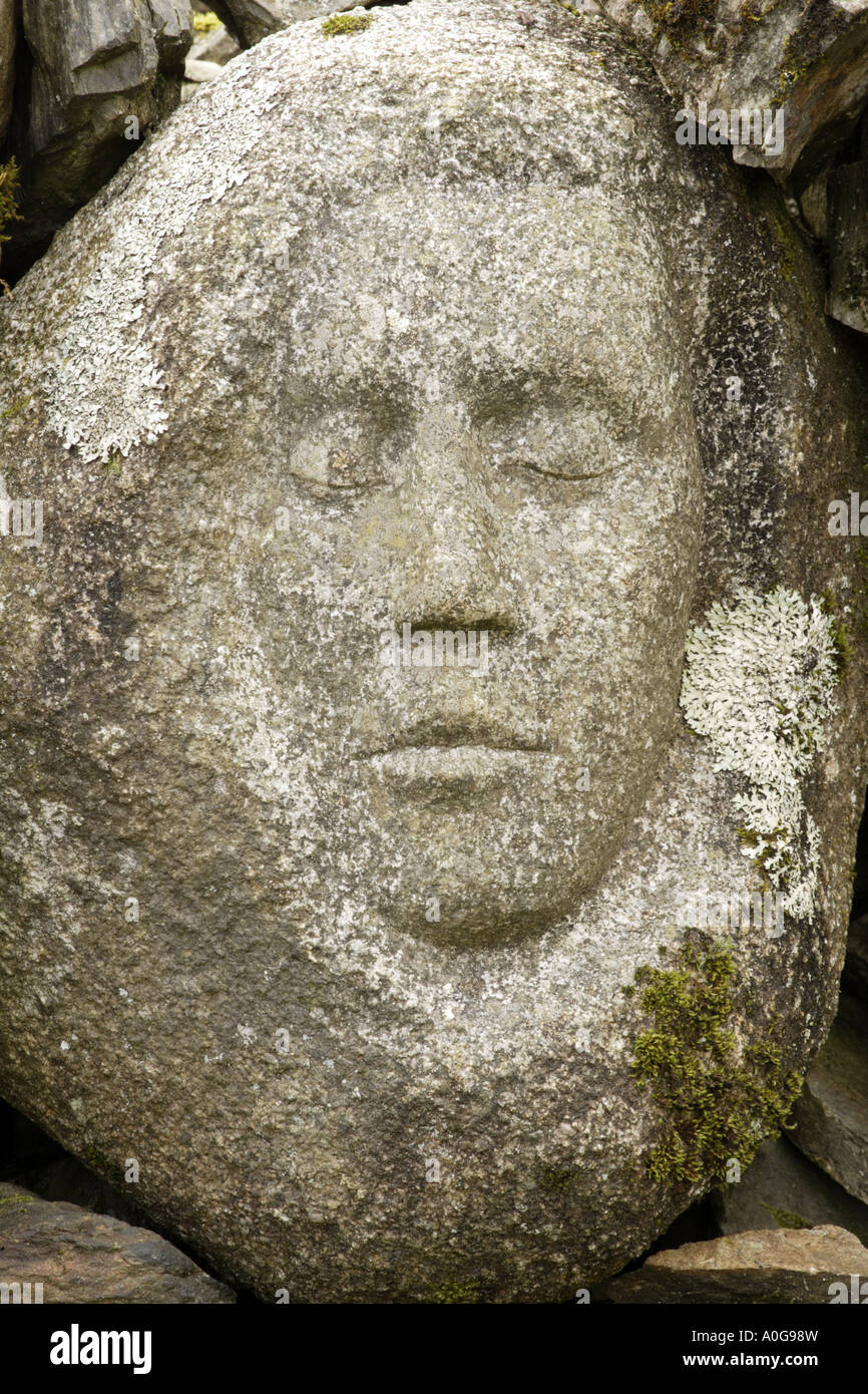 Stone face sculpture Stock Photo - Alamy
