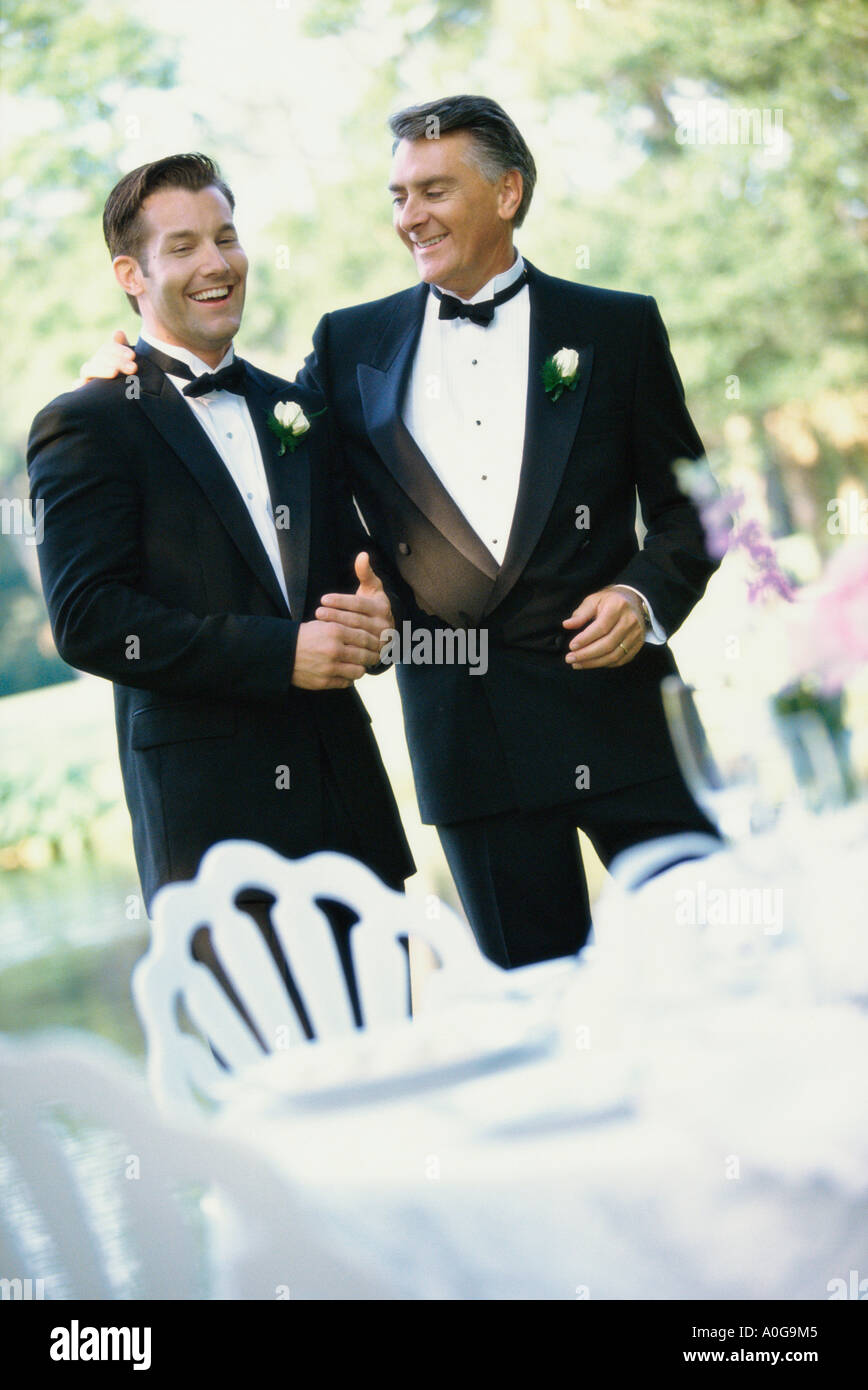 Newlywed young man talking with his father Stock Photo - Alamy