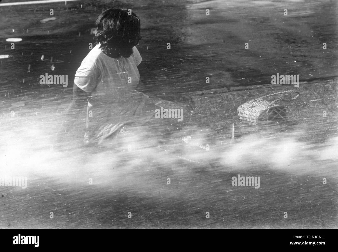 Birmingham AL 1963 A woman is hit by a hose from behind and knocked to ...
