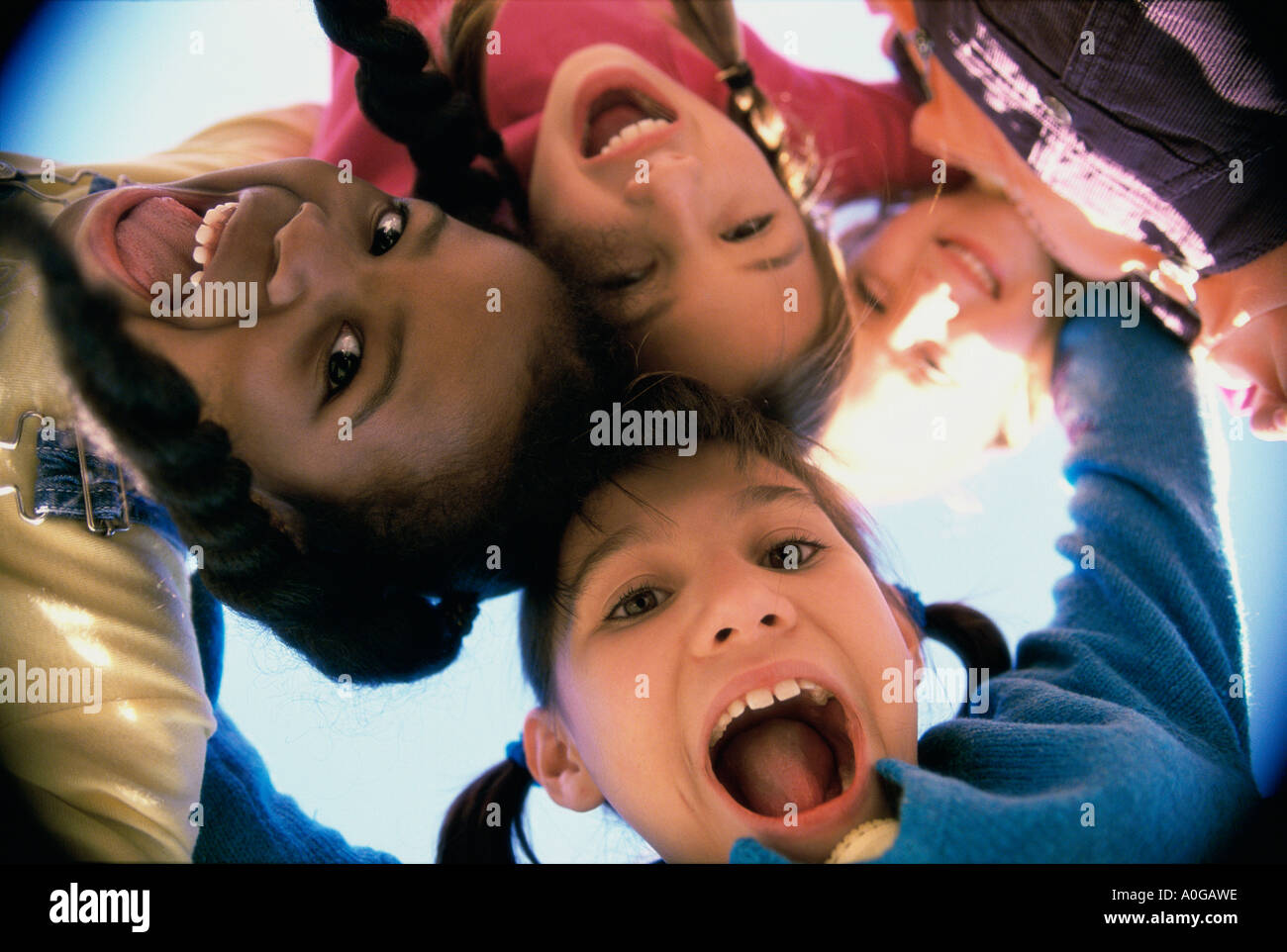 Girls in huddle looking at camera hi-res stock photography and images ...