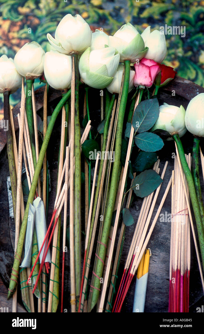 White flowers candles buddhist hi-res stock photography and images - Alamy