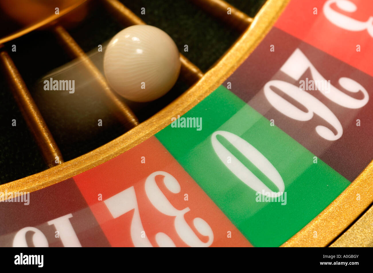 Roullette wheel spinning with ball in number zero with motion blur ...