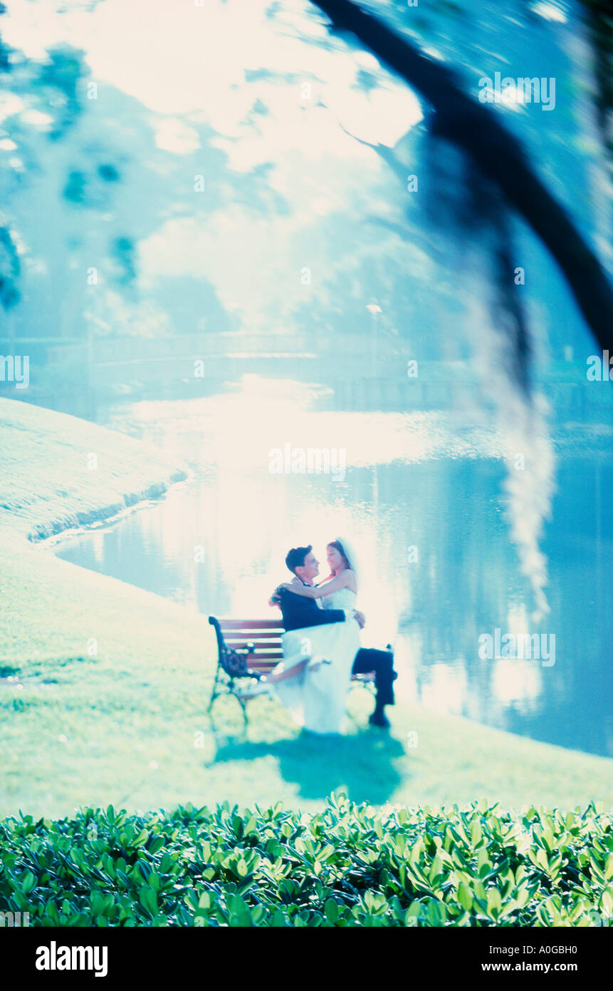Adults outdoors sitting on park bench hi-res stock photography and ...