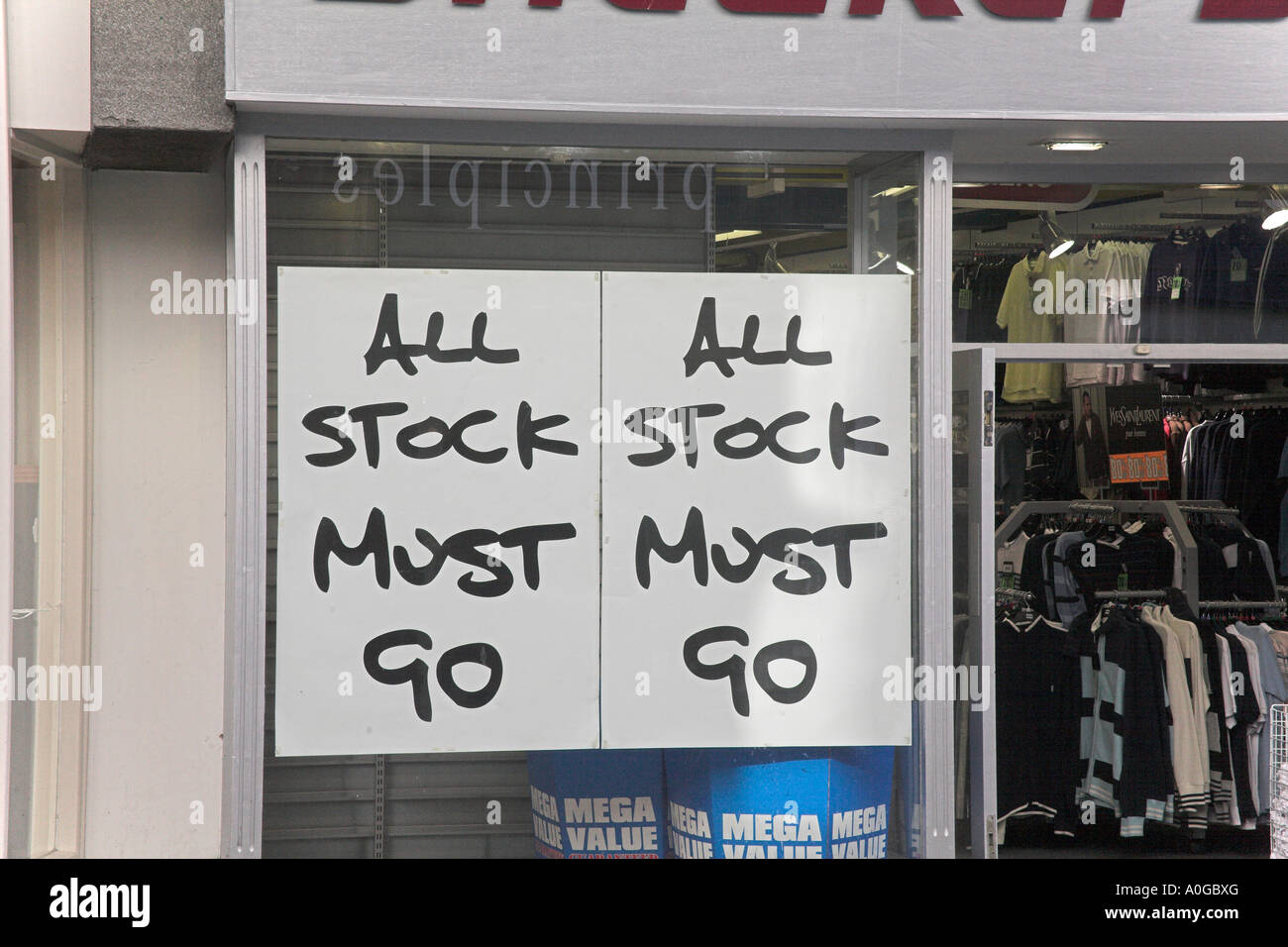 Stock photograph of sale poster in shop window Stock Photo - Alamy
