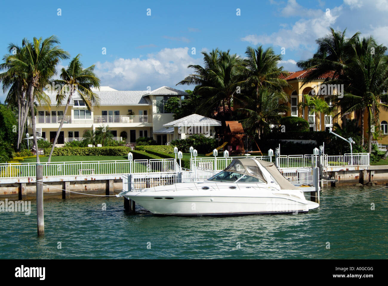 Luxury home and motorboat on the waterfront Miami Florida America USA ...