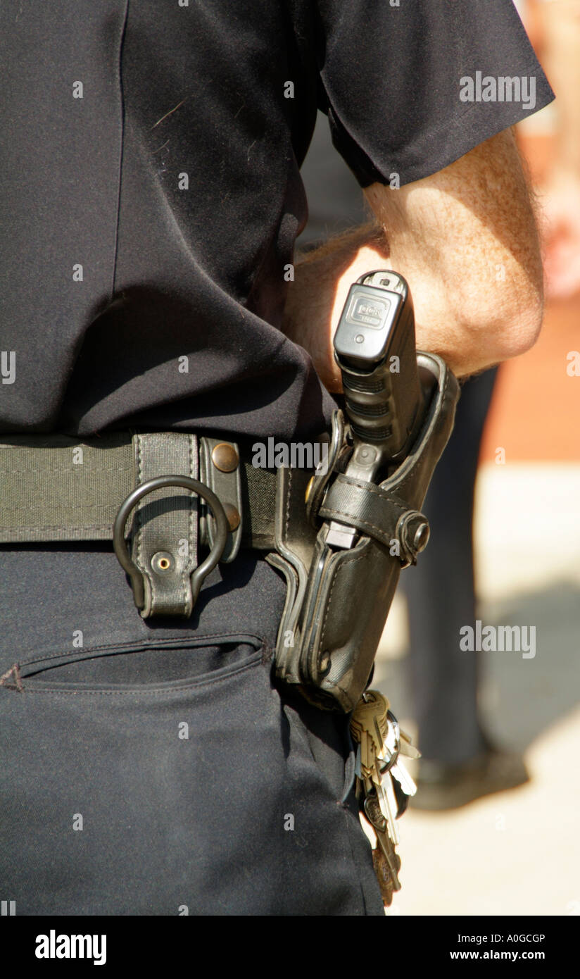 Handgun Police officers Glock pistol USA Police officers gun held in ...