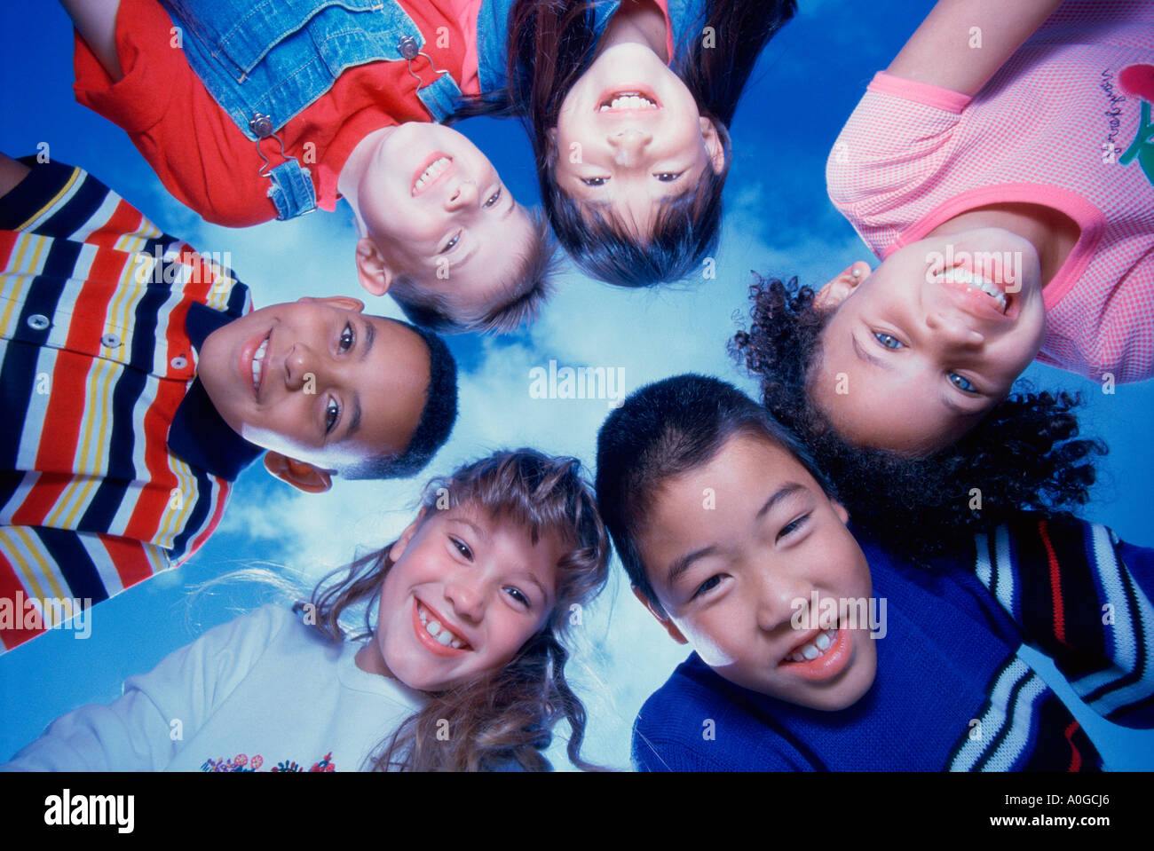 Girls in huddle looking at camera hi-res stock photography and images ...