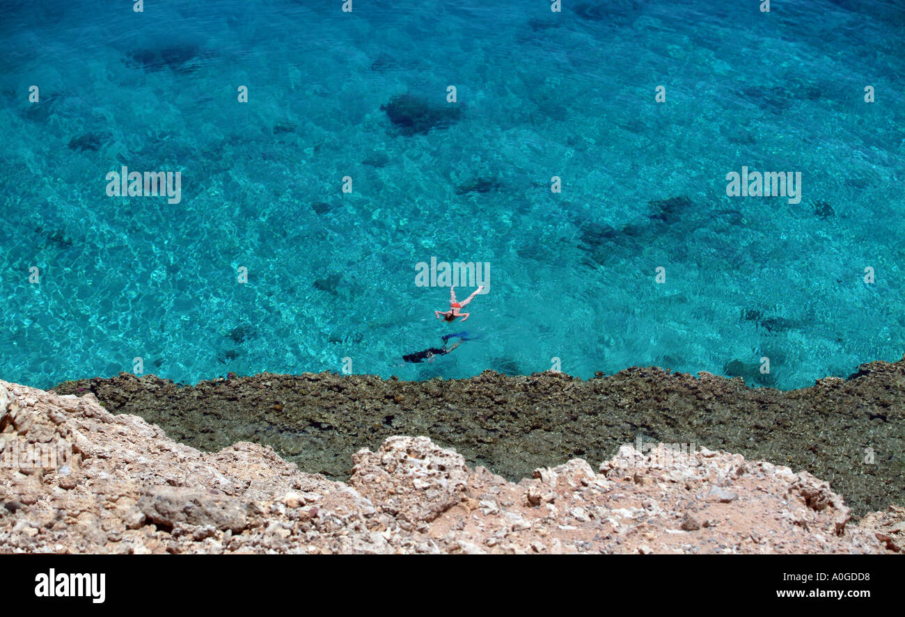 Snorkeling GIRL and boy at Naama Bay Sharm El Sheikh Egypt in the clear ...