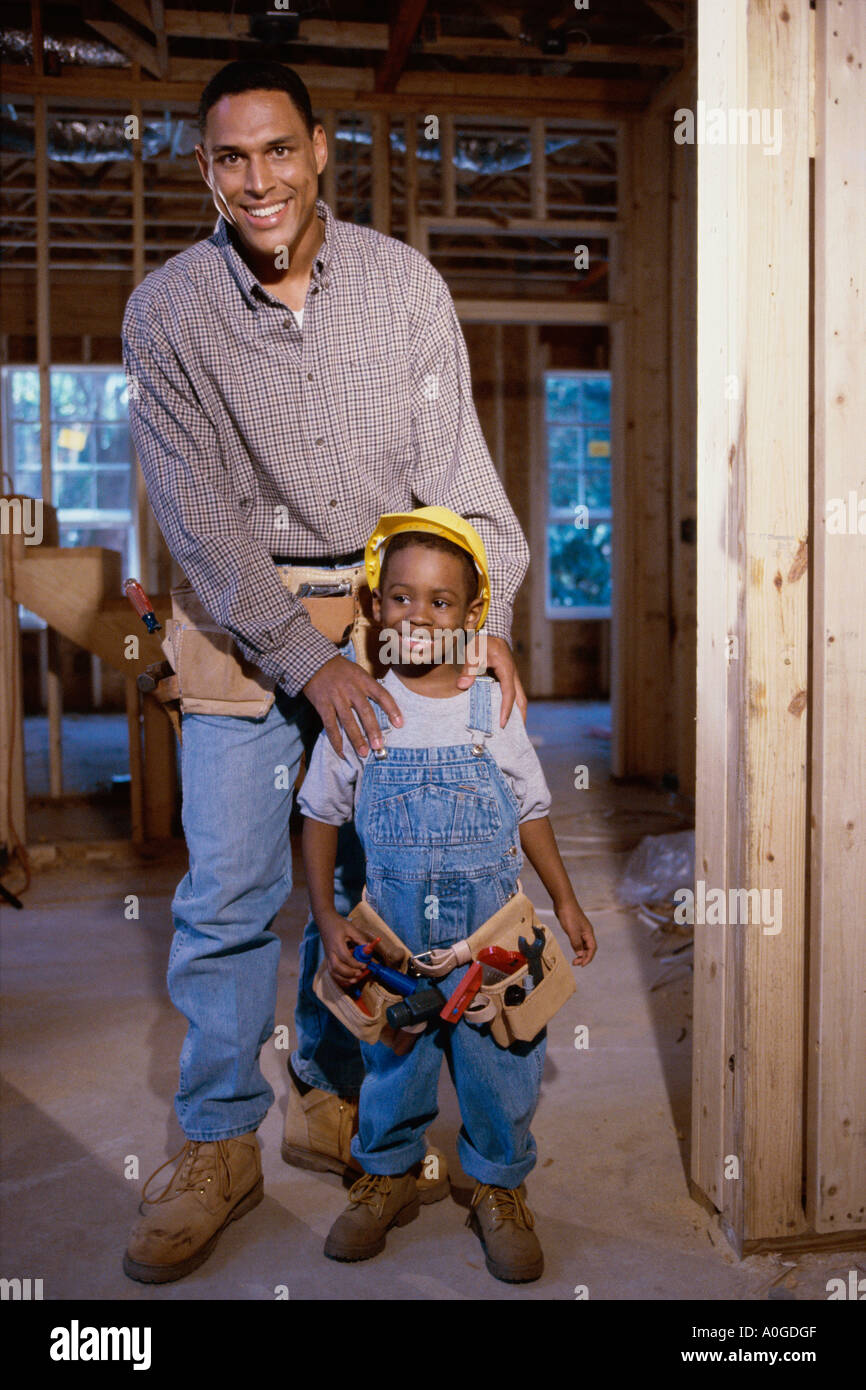 Father standing with his son at a construction site Stock Photo - Alamy