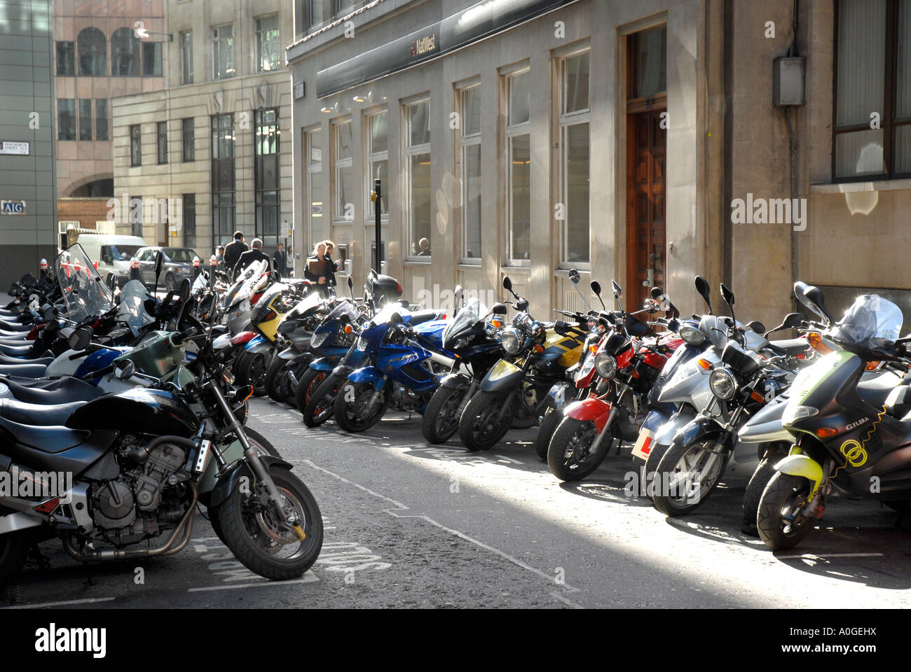 Motorcycles parked in street in the City of London Stock Photo - Alamy