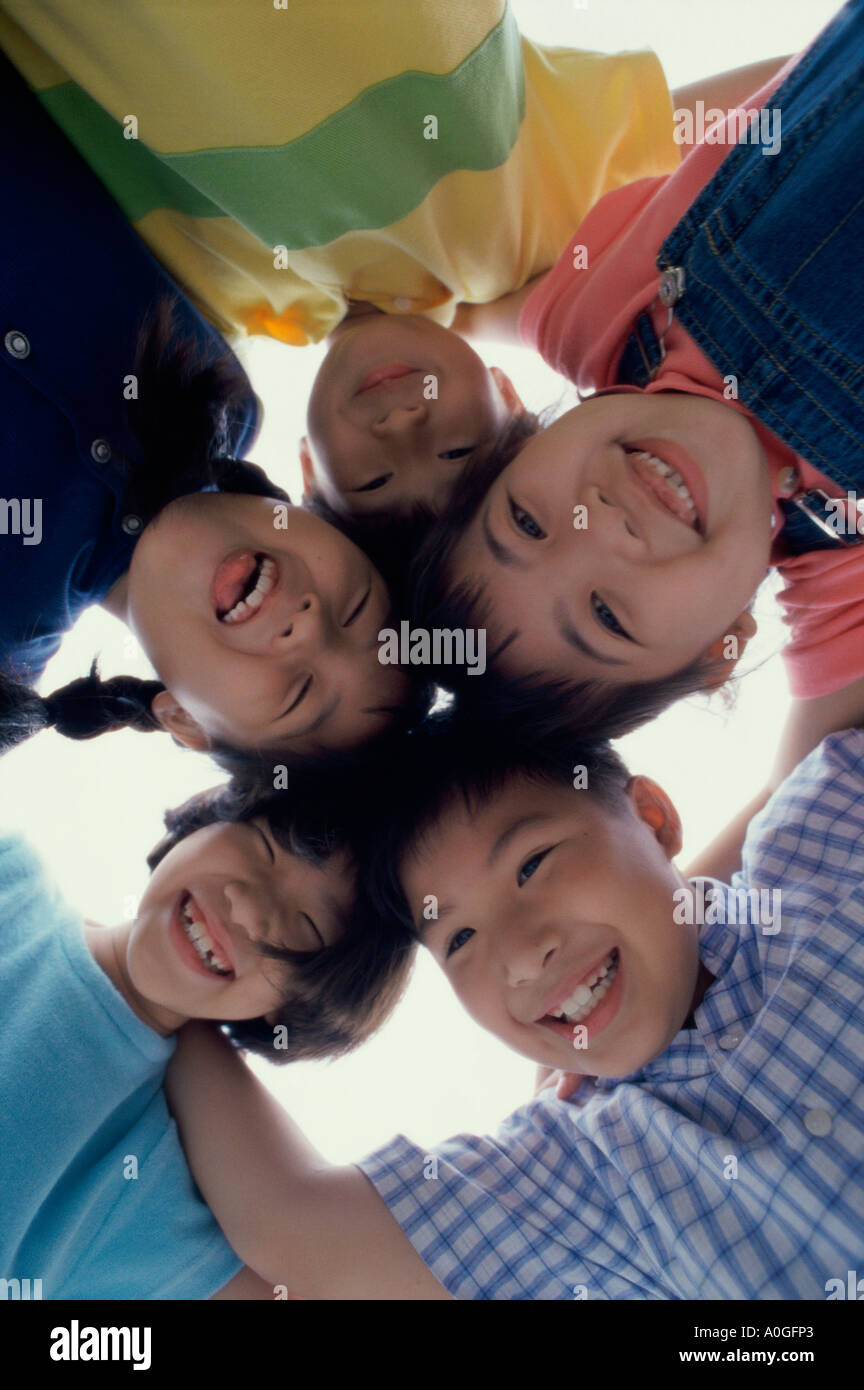 Girls in huddle looking at camera hi-res stock photography and images ...