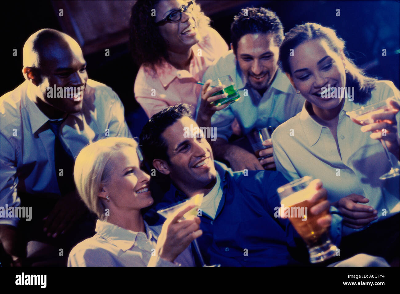 Group of young people in a bar Stock Photo - Alamy
