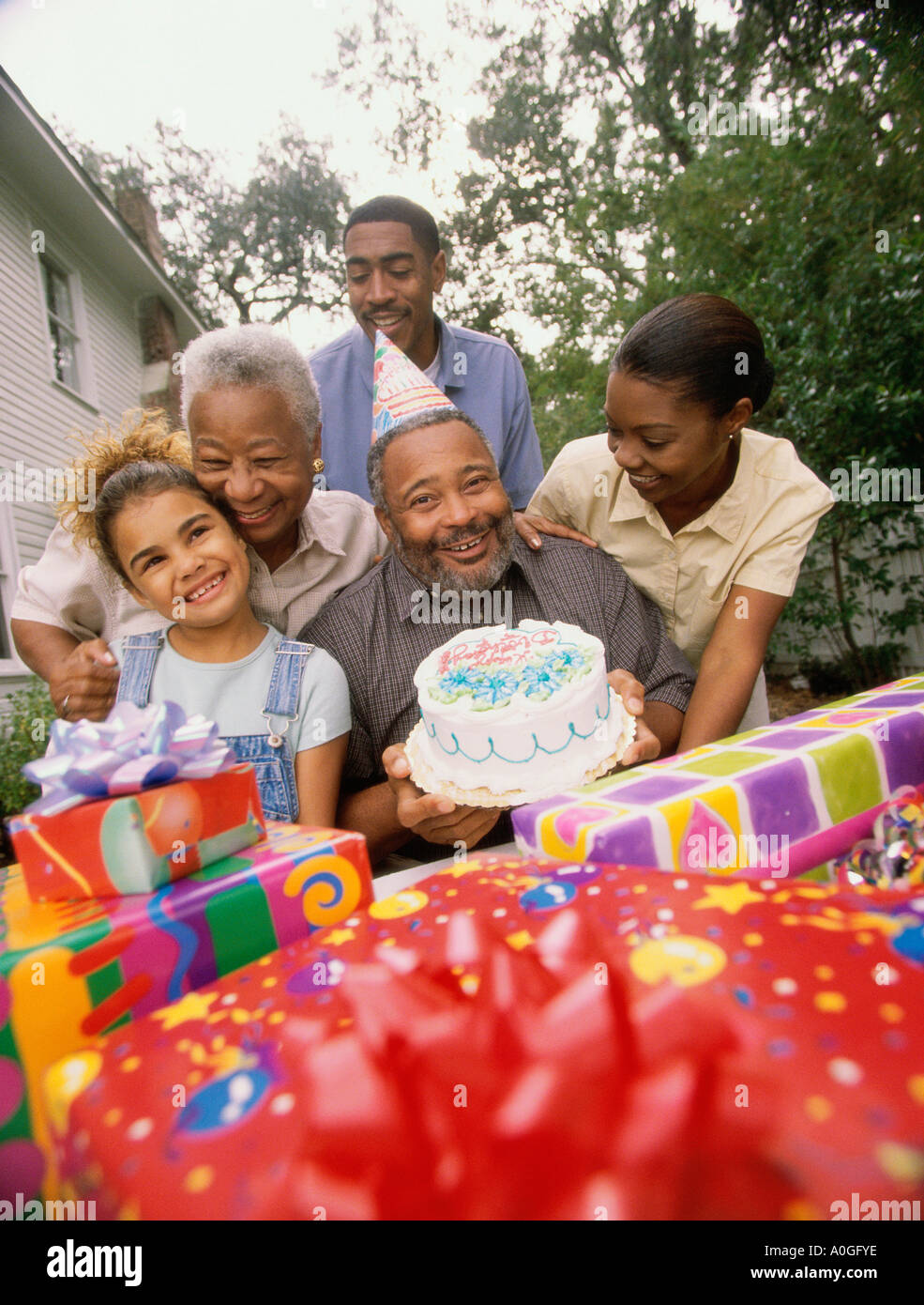 Portrait of a family at a birthday party Stock Photo - Alamy