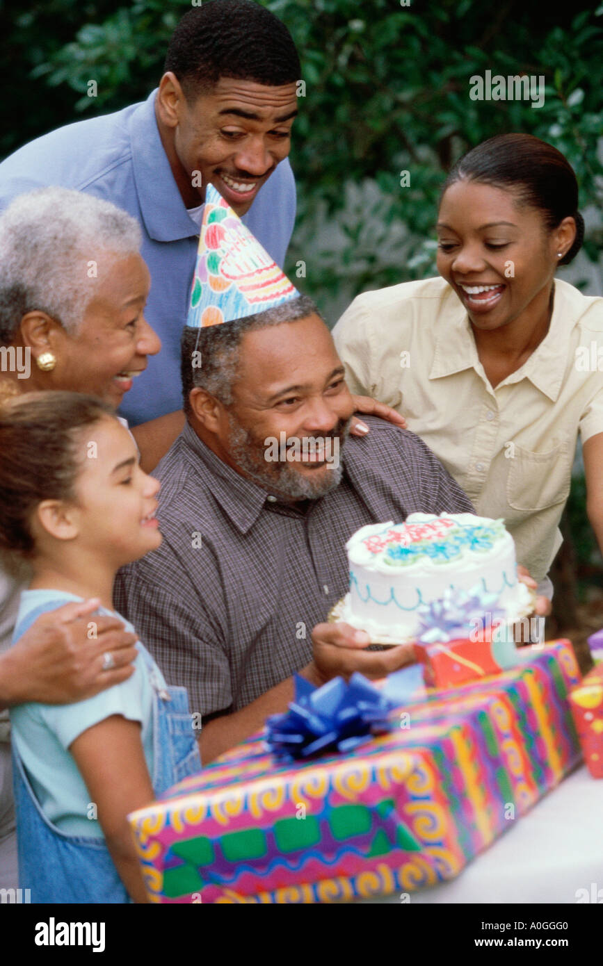 Family at a birthday party Stock Photo - Alamy