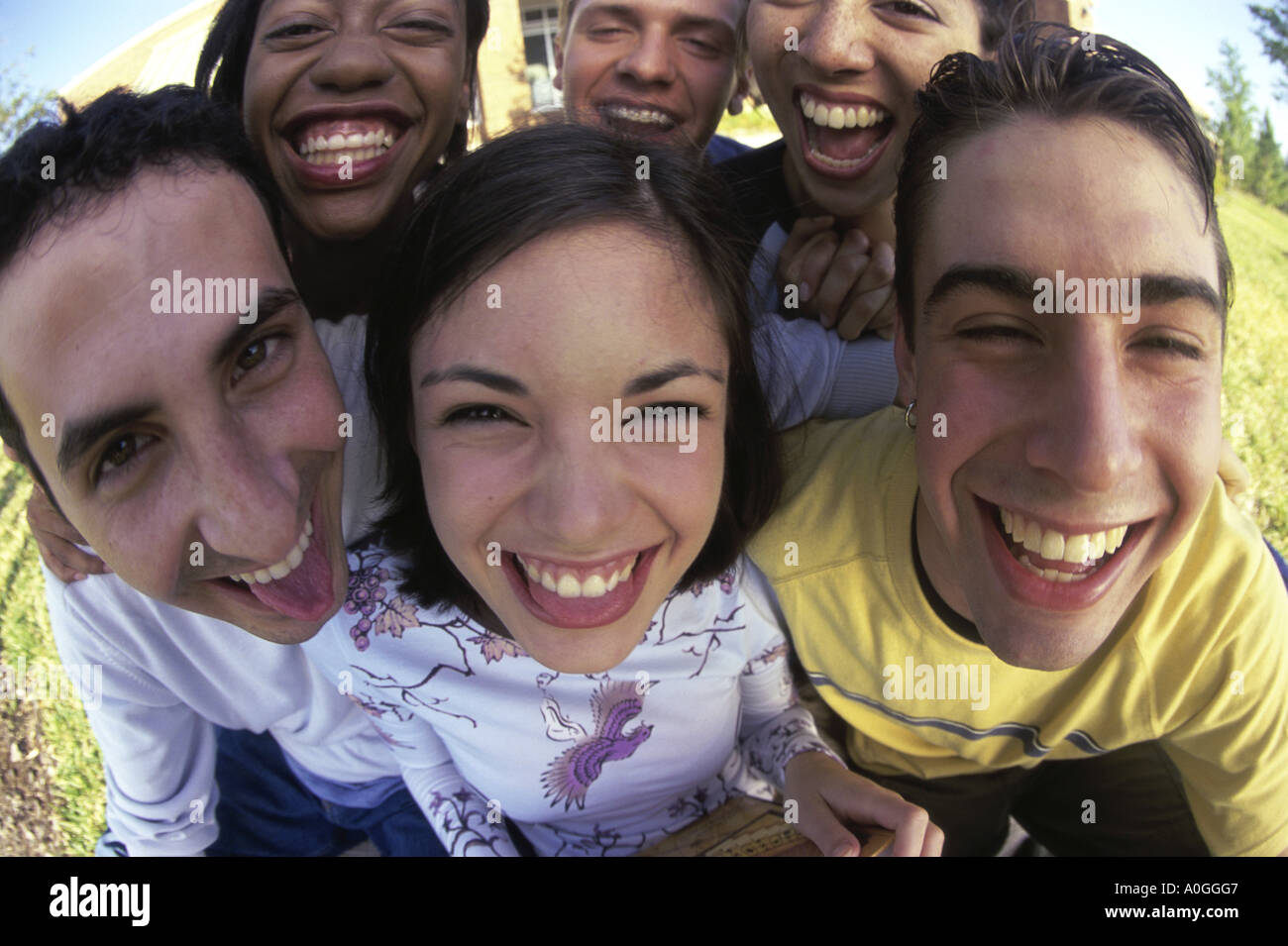 Portrait of a group of teenagers smiling Stock Photo - Alamy