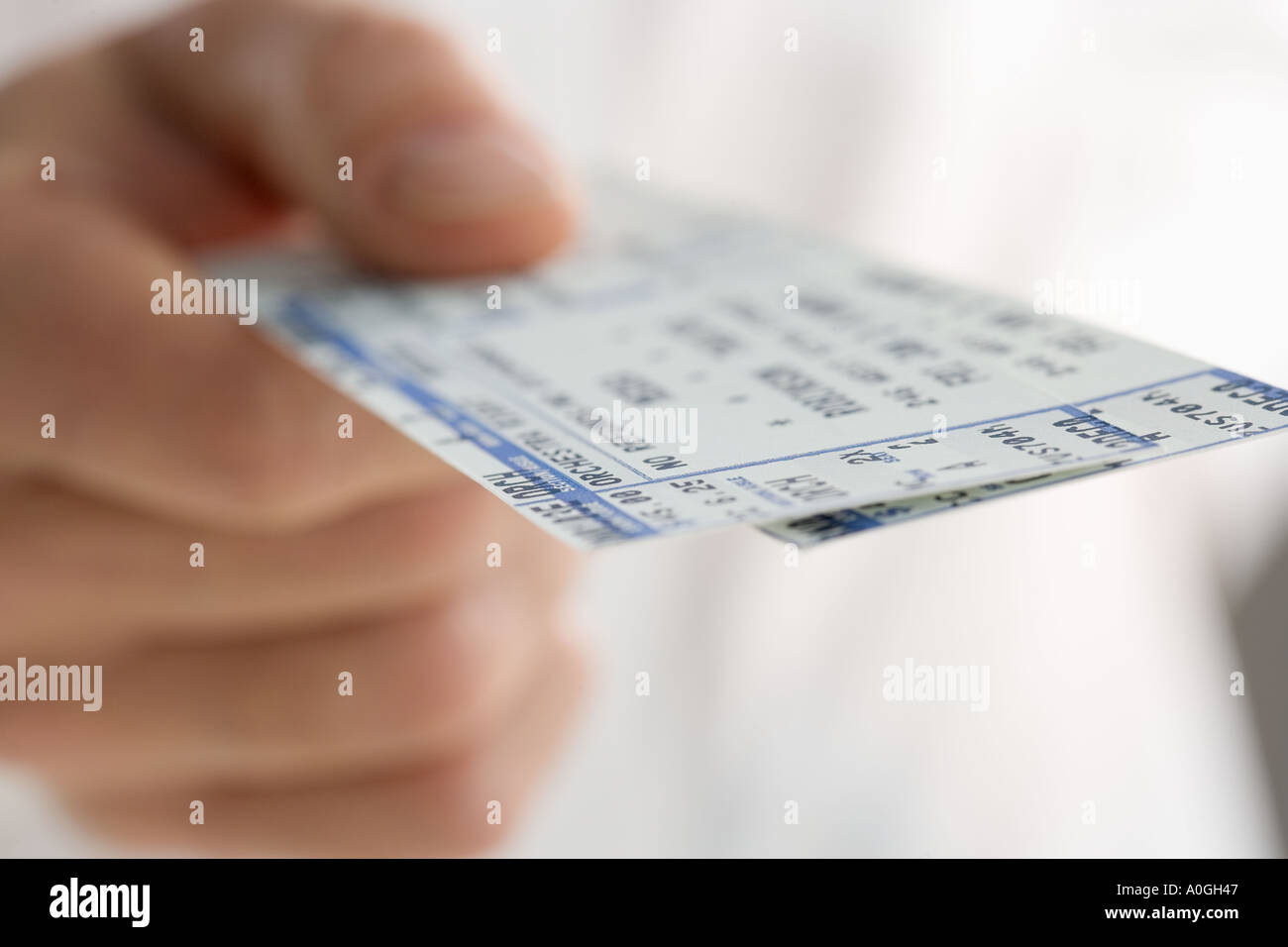 Hand holding tickets hi-res stock photography and images - Alamy