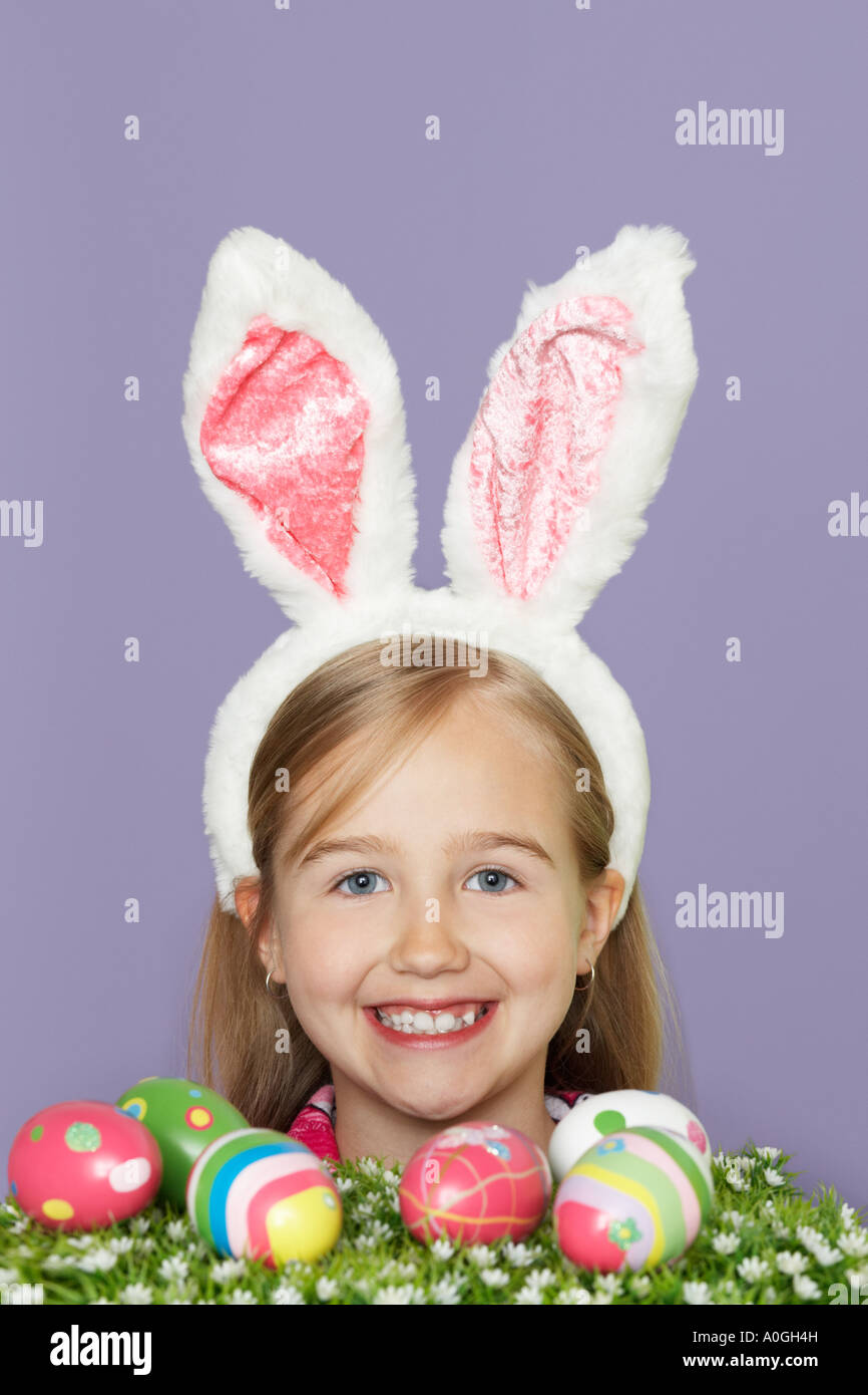Girl wearing rabbit ears Stock Photo - Alamy