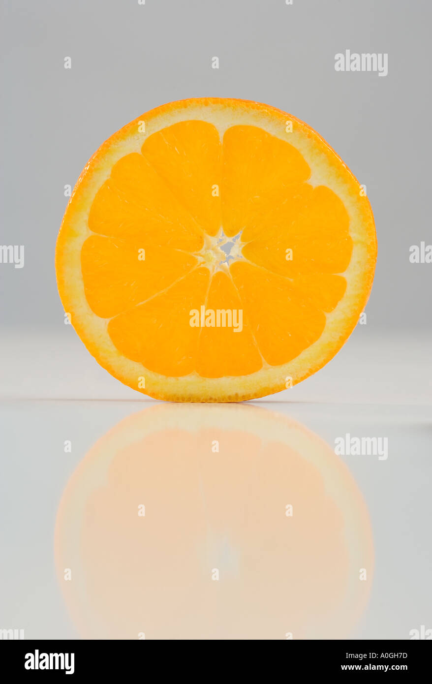 Round slice of an orange Stock Photo - Alamy