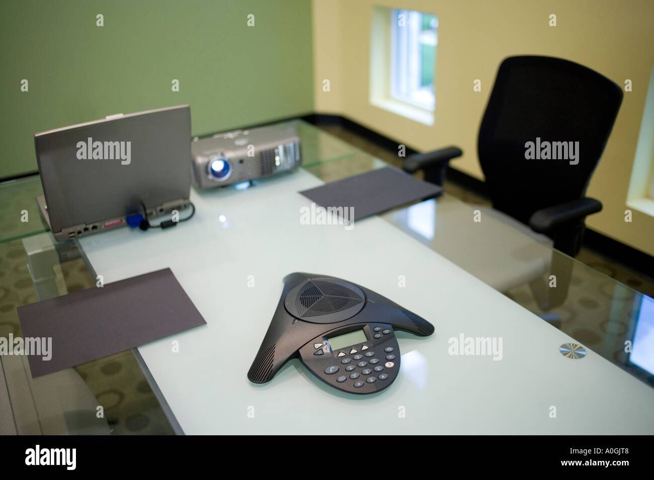 Slide projector and conference phone in a conference room Stock Photo ...