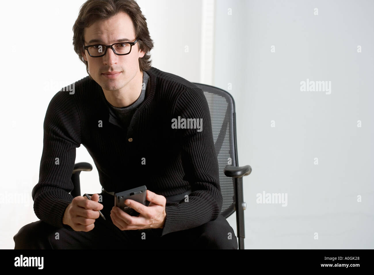 Man seated hi-res stock photography and images - Alamy