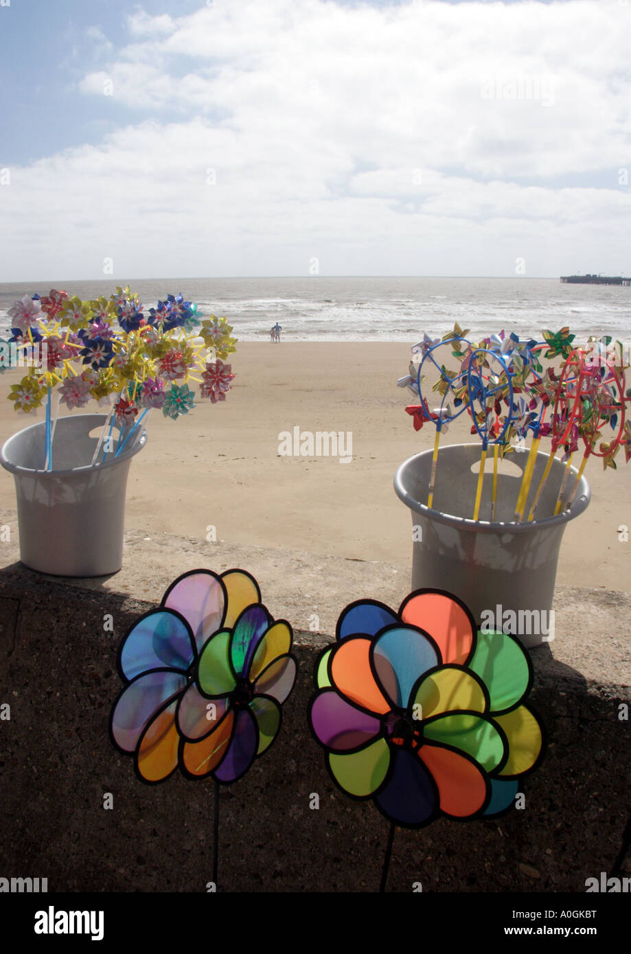 windmills on the beach Stock Photo - Alamy