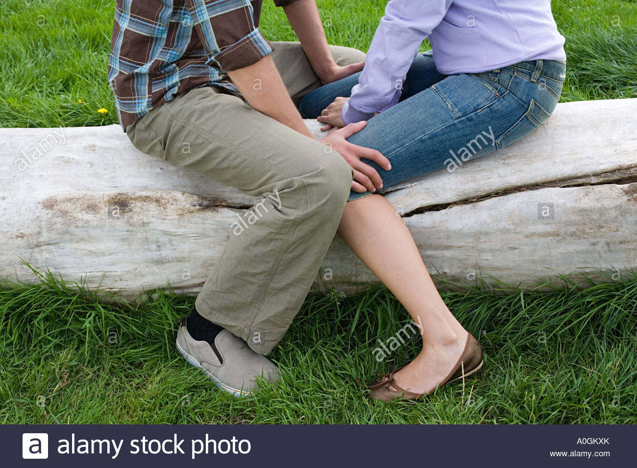 Man Sitting On Log On Stock Photos & Man Sitting On Log On Stock Images ...