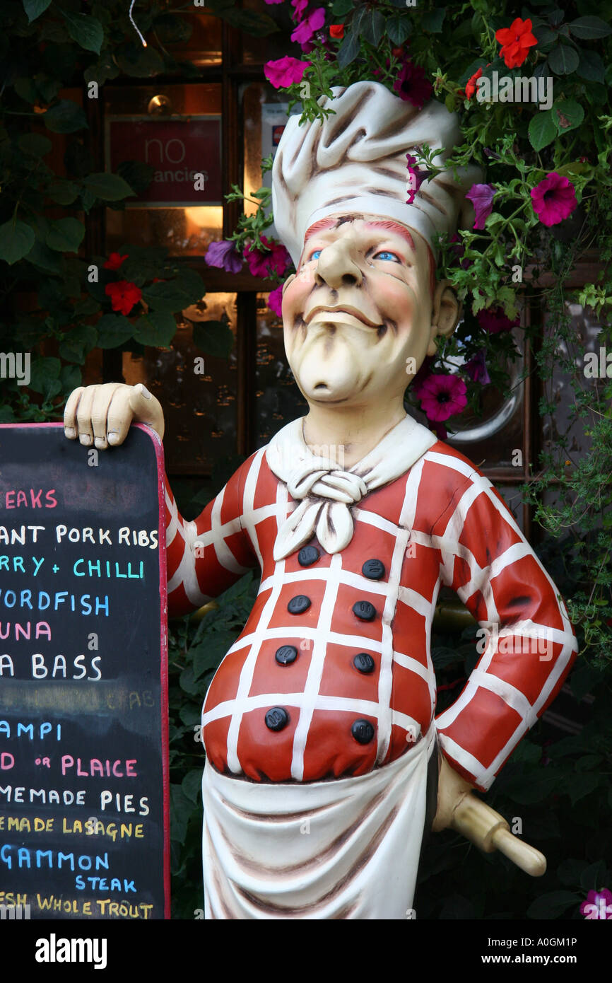 Chef advertising the day’s menu Stock Photo - Alamy