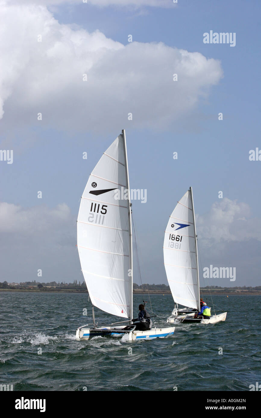 A pair of Catamaran's on the River Backwater Essex Stock Photo - Alamy