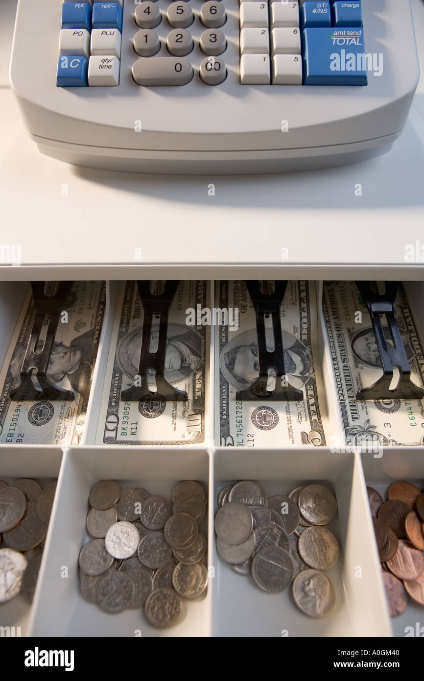 Register with open drawer of money Stock Photo - Alamy