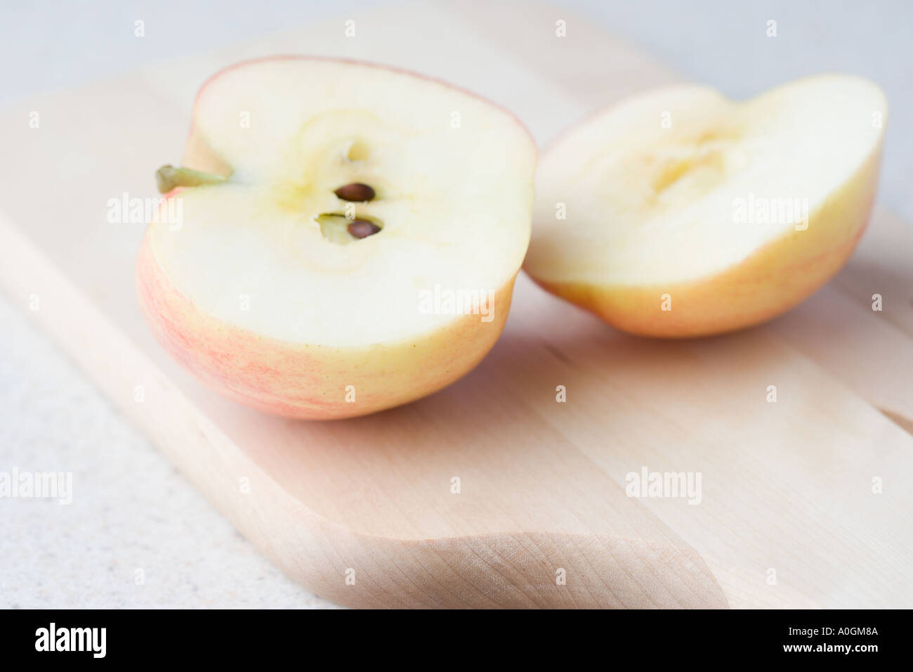Apple halves on cutting hi-res stock photography and images - Alamy