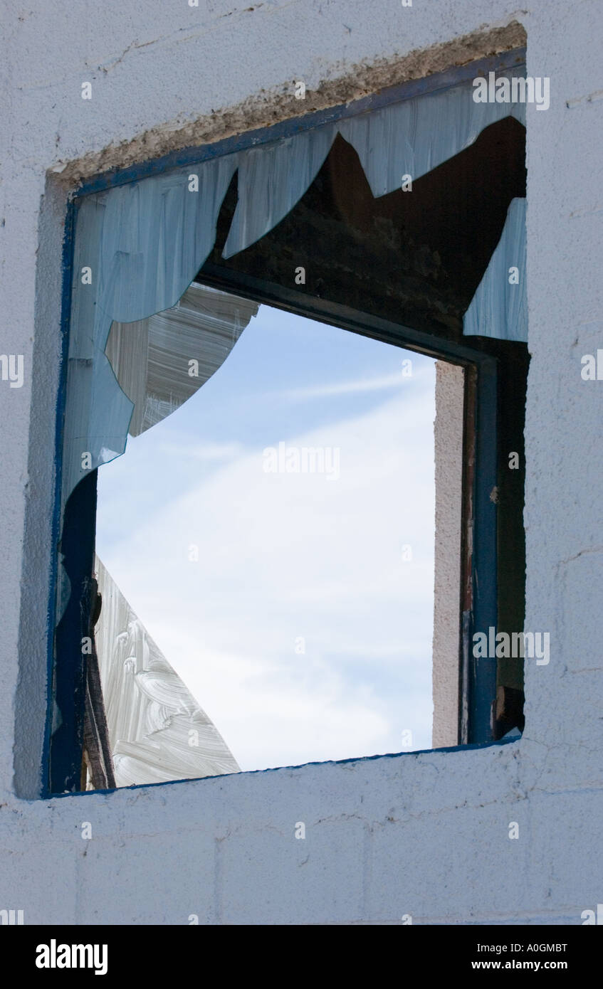 Broken window, El Condor, Argentina Stock Photo - Alamy
