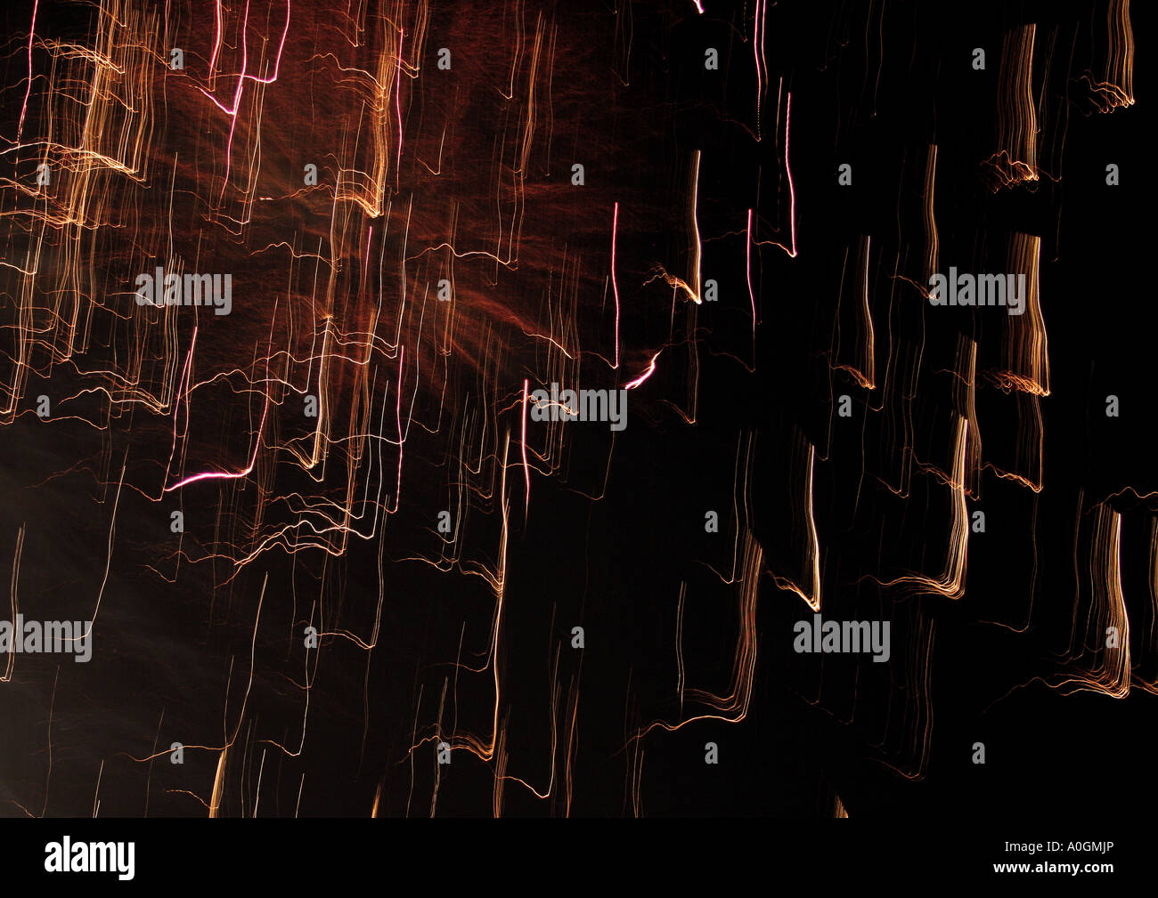 golden sparkes raining down from a rocket Stock Photo - Alamy