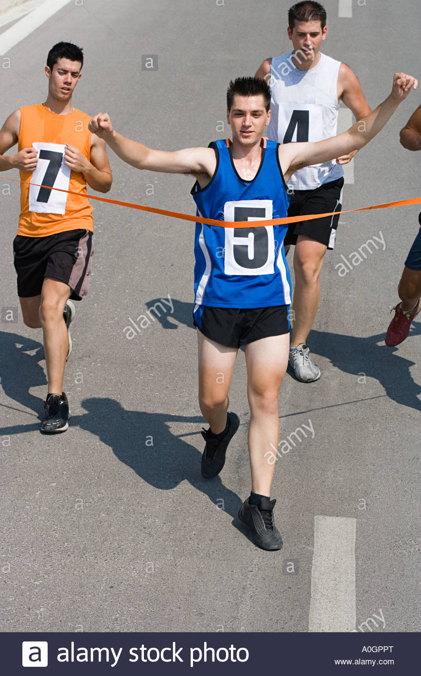 Runners Finish Line Stock Photos & Runners Finish Line Stock Images - Alamy