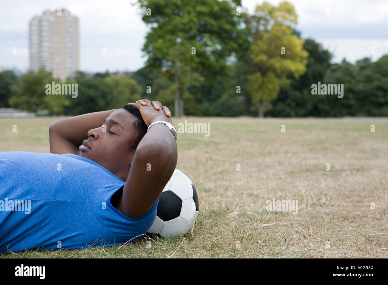 Boy sleeping ball hi-res stock photography and images - Alamy