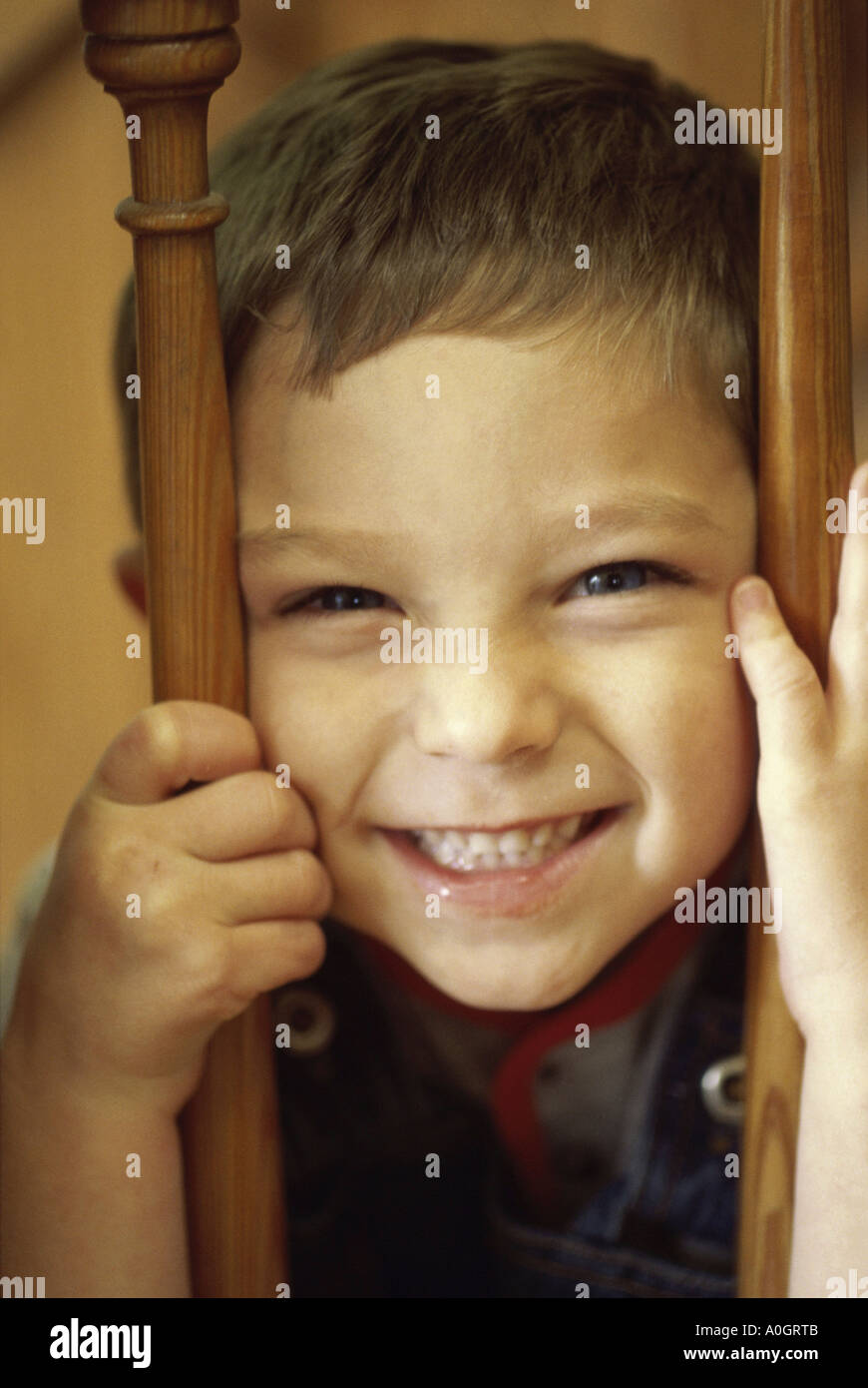 Portrait of a boy laughing Stock Photo - Alamy