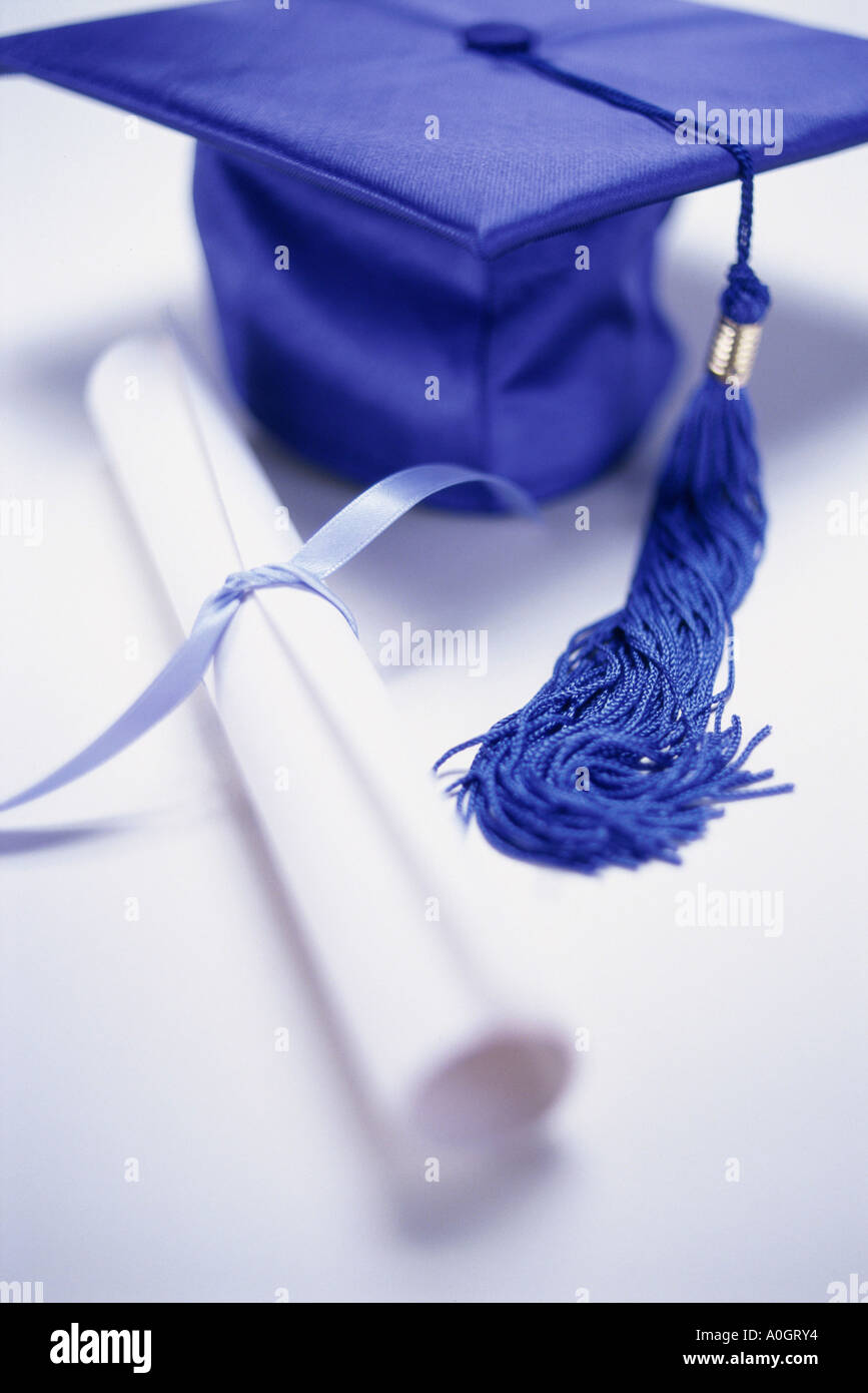 Close-up of a mortarboard and a diploma Stock Photo - Alamy