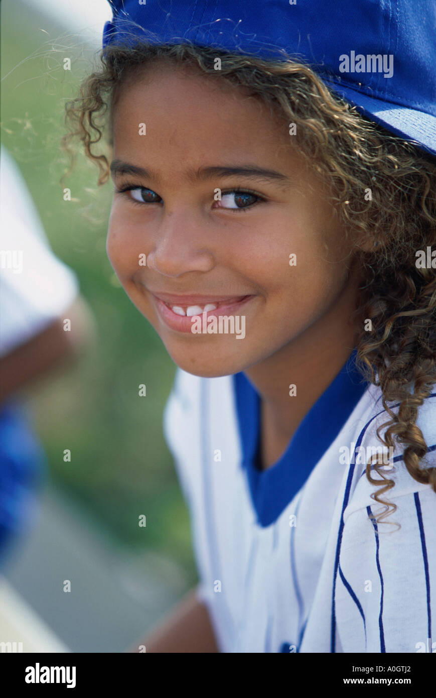 Girl in baseball uniform hi-res stock photography and images - Alamy
