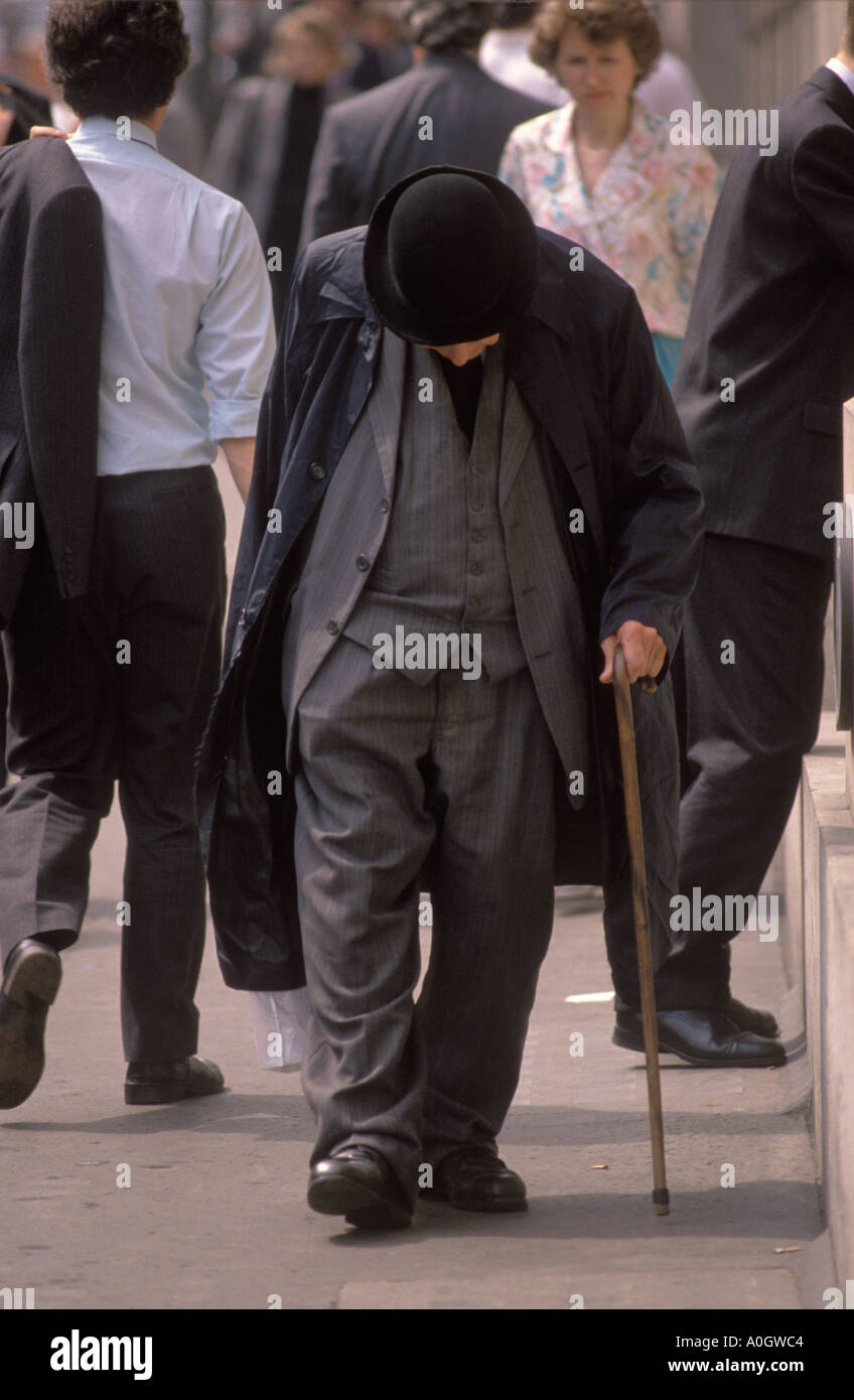 Old man walking bent hi-res stock photography and images - Alamy