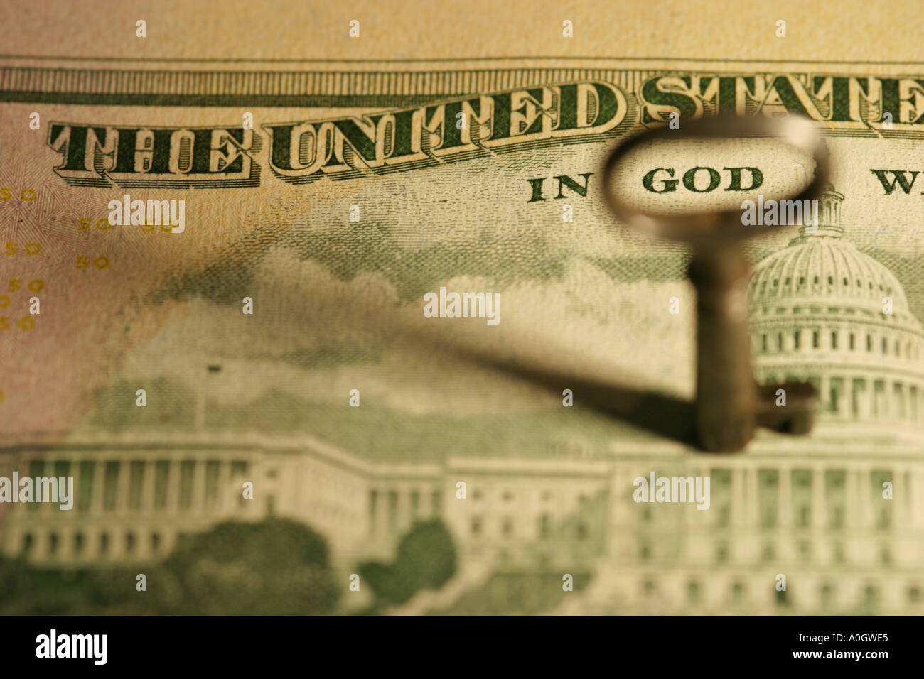 dollar notes with key Stock Photo - Alamy