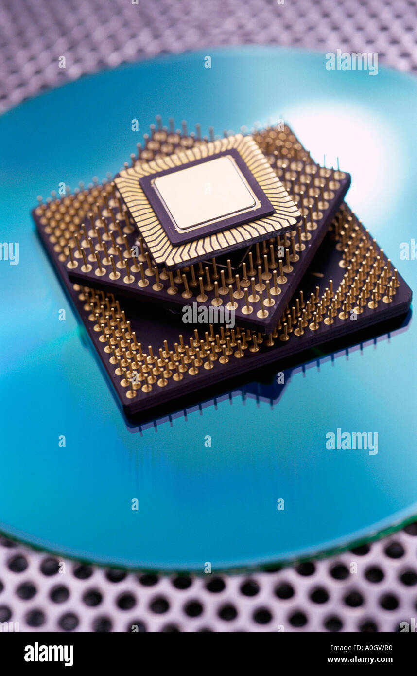 Three computer chips placed one on top of the other Stock Photo - Alamy