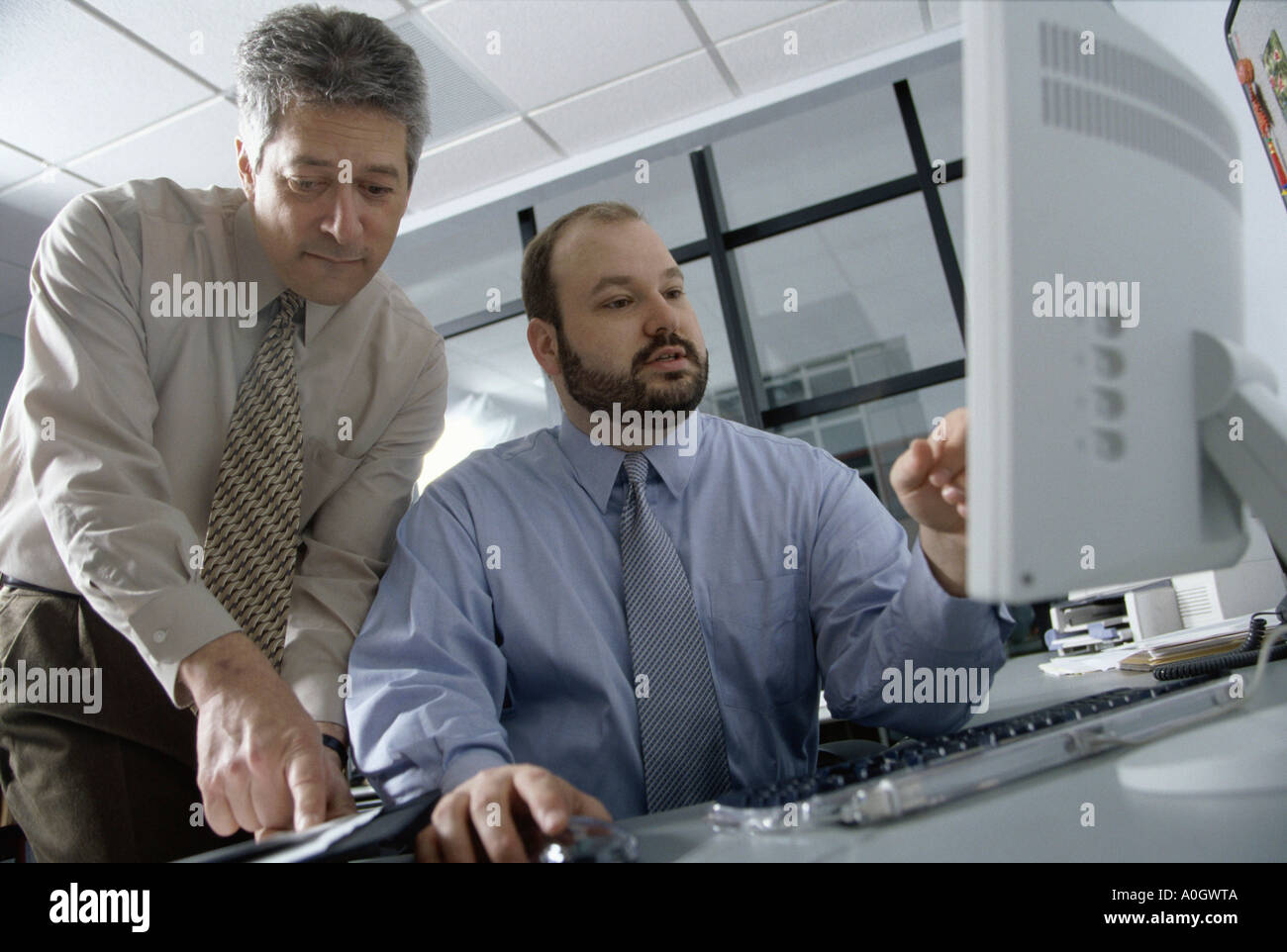 Two businessmen in an office Stock Photo - Alamy