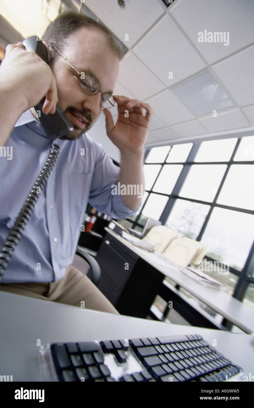 Man on telephone landline hi-res stock photography and images - Alamy