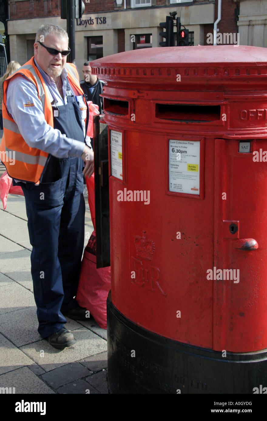 Uk postman standing hi-res stock photography and images - Alamy