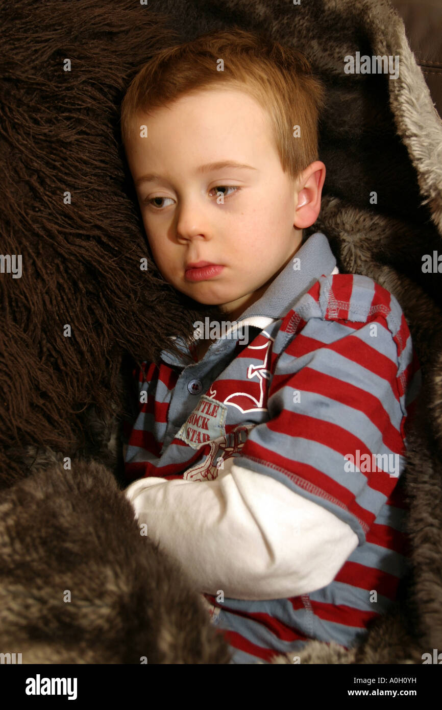 young boy sulking Stock Photo - Alamy