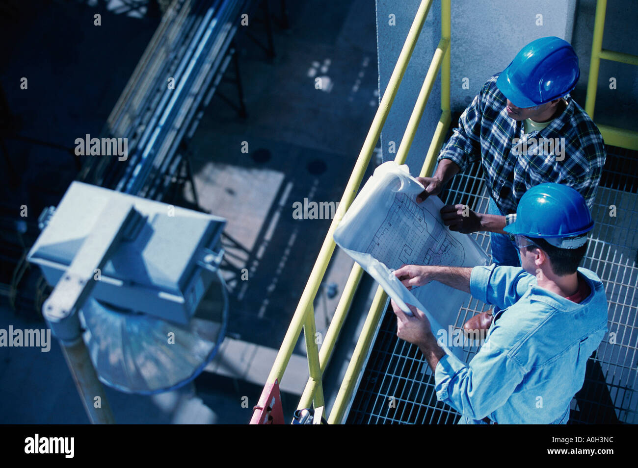 High angle view men working hi-res stock photography and images - Alamy