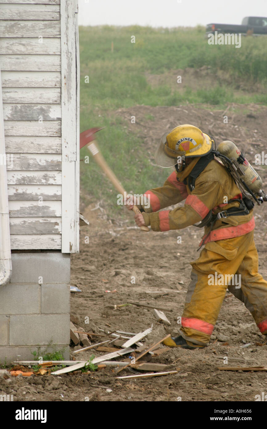 Firefighter with Axe Stock Photo - Alamy